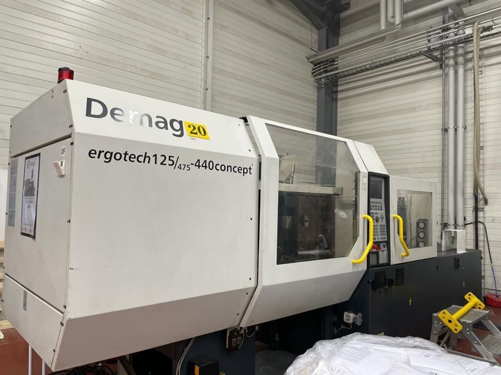 DEMAG CONCEPT 1250-440 MACHINE DE MOULAGE PAR INJECTION d'occasion